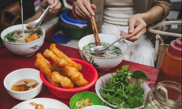 How do I use chopsticks properly?